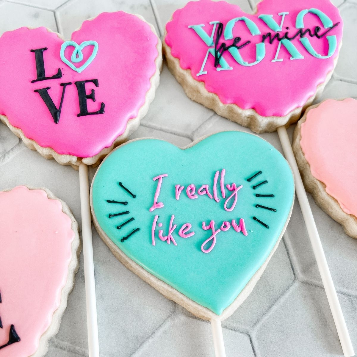 Valentine Cookie Pops [Sugar Cookie Hearts] - The Frosted Kitchen